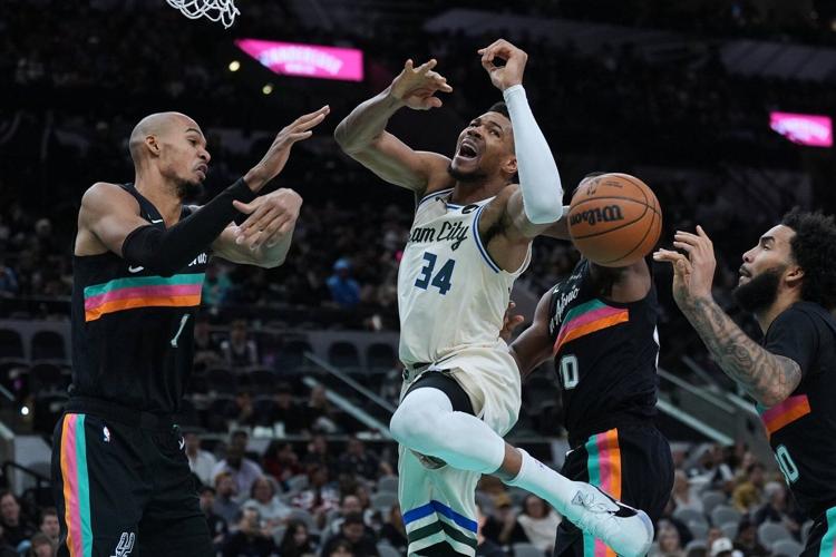 Wembanyama returns from injury scare to fuel Spurs past Bucks, 119-101