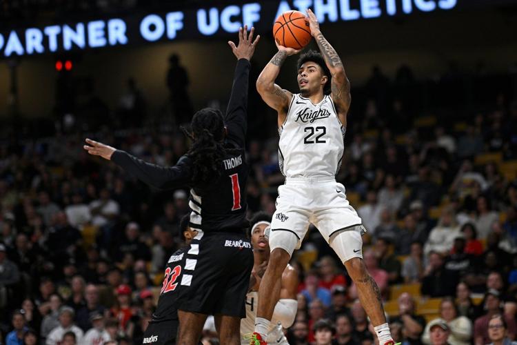 No. 25 UCF beats Cincinnati 73-72 on Themus Fulks' jumper in final seconds