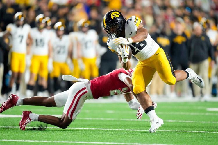Williams, Gronowski and Moulton help Iowa run over Wisconsin 37-0 to ...
