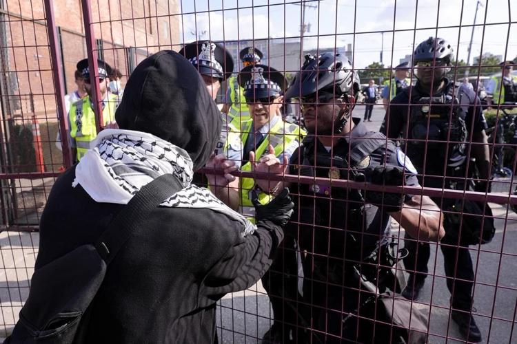 Pro-Palestinian protesters clash with police near Chicago's Israeli ...