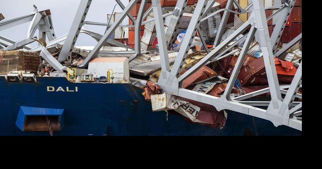 Salvage crews have begun removing containers from the ship that ...