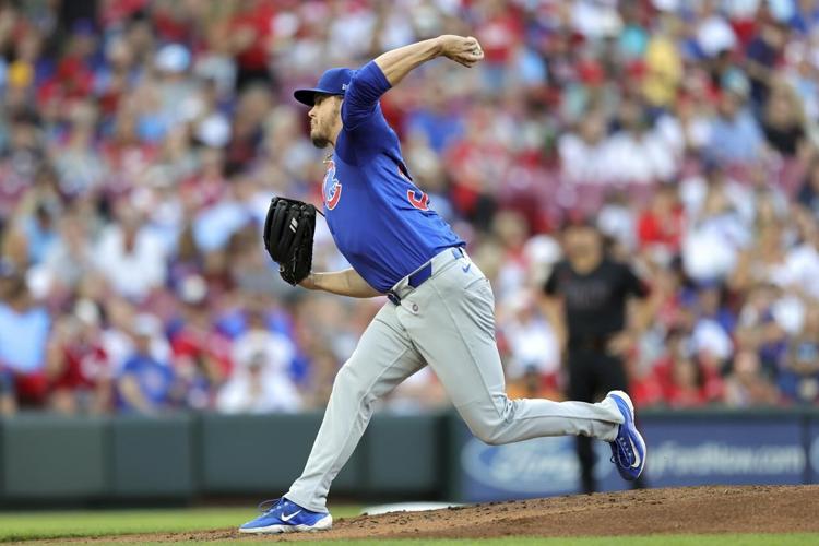 Surging Reds beat Cubs 3-2 for 6th straight victory