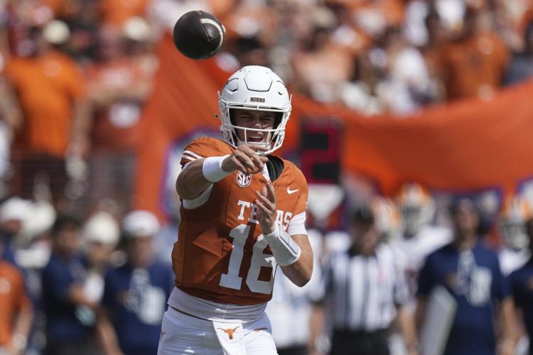 Manning runs for 2 touchdowns but struggles again in passing game as No. 7 Texas beats UTEP 27-10