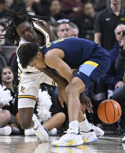 Kam Jones had 18 points and 10 assists to No. 8 Marquette to a 78-50 win over Providence
