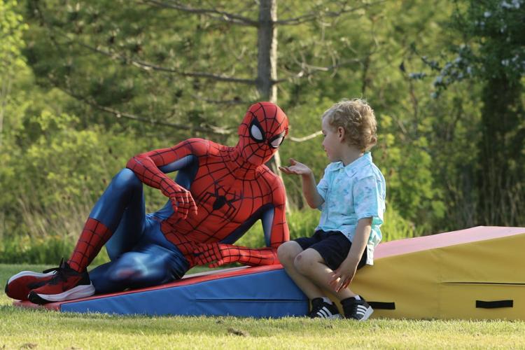 Gymnast puts acrobatic skills to work as Spider-Man performer