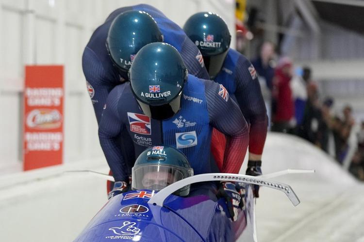 Friedrich leads 4-man world bobsled title race as weather takes its toll on Lake Placid track
