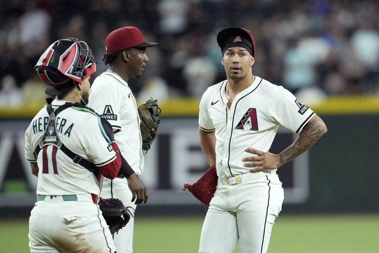Diamondbacks place reliever Martinez on injured list with sprained ...