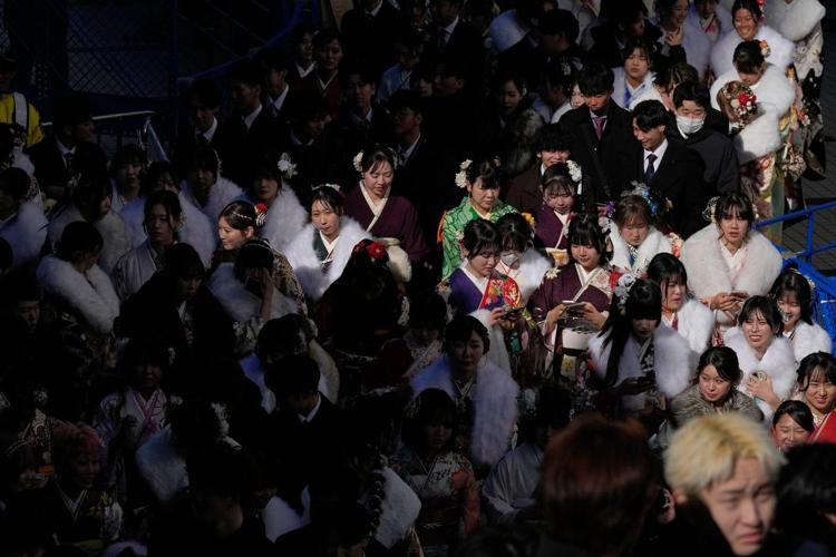 Photos of 20-year-olds at a Coming of Age Day ceremony in Japan