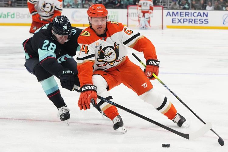 Marchment scores in Seattle debut as Kraken win season opener for first ...