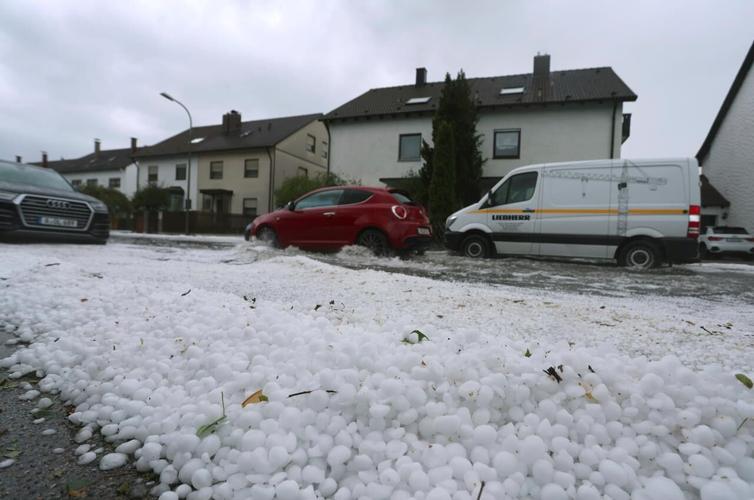 Large hailstones cause extensive damage in a small German town as a ...