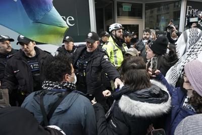 Police arrest two at protest outside Trudeau event, including Rebel ...