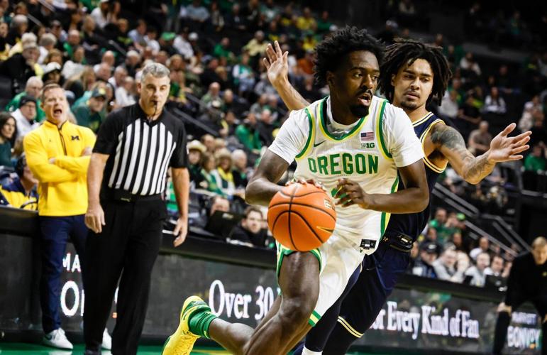 Elliot Cadeau scores 17 points to lead No. 4 Michigan over Oregon 81-71