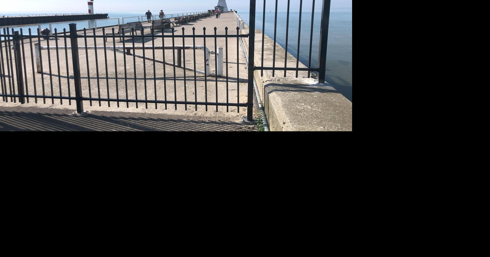New fence blocking Port Dover pier rankles residents
