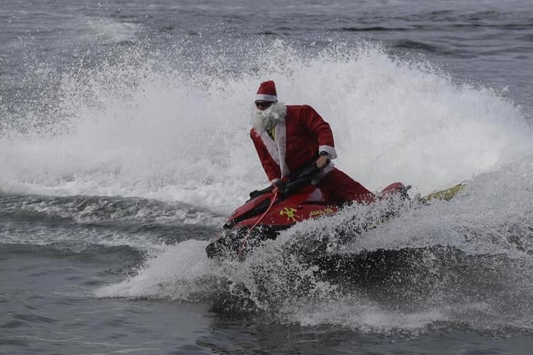 Brazilian Santa swaps sleigh for Jet Ski to deliver toys - and joy - to ...