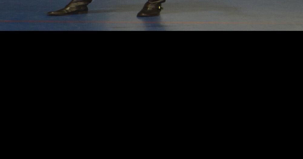 Waterdown's Allan A. Greenleaf celebrates Pan Am medal with former student