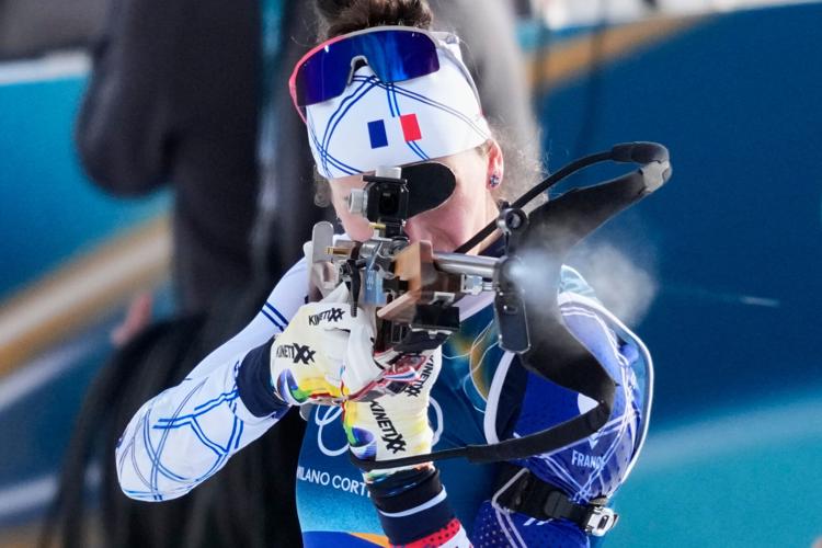 France takes gold in the first biathlon race of the Winter Olympics as ...