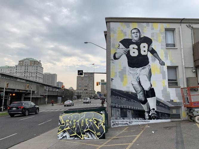 Mural, mural on the Hamilton wall: Scott McDonald is putting his mark ...
