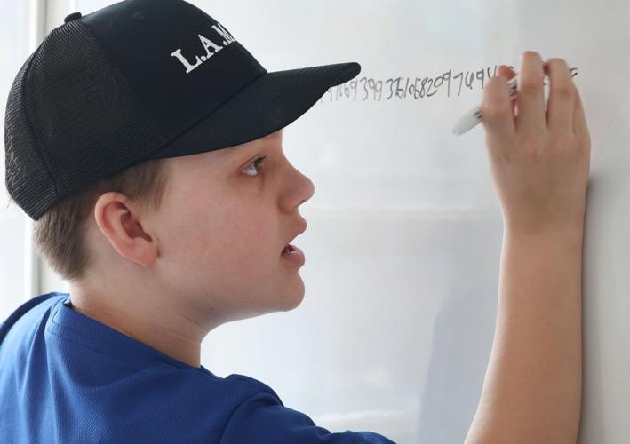 Hamilton student recites 314 digits of pi in 60 seconds