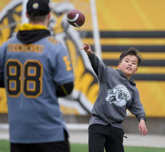 Ticats and kids have fun on the field