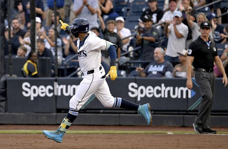Montgomery homers and drives in 5 to rally White Sox past Rays 11-9