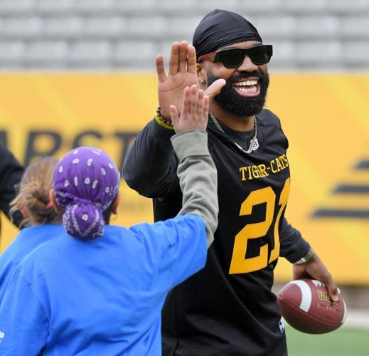 Ticats and kids have fun on the field
