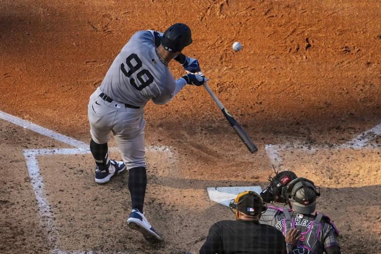 Aaron Judge gets struck in the face by a toss from Yankees teammate Anthony Volpe