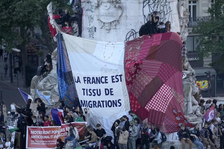 People of diverse backgrounds in France welcome far right's defeat, but ...
