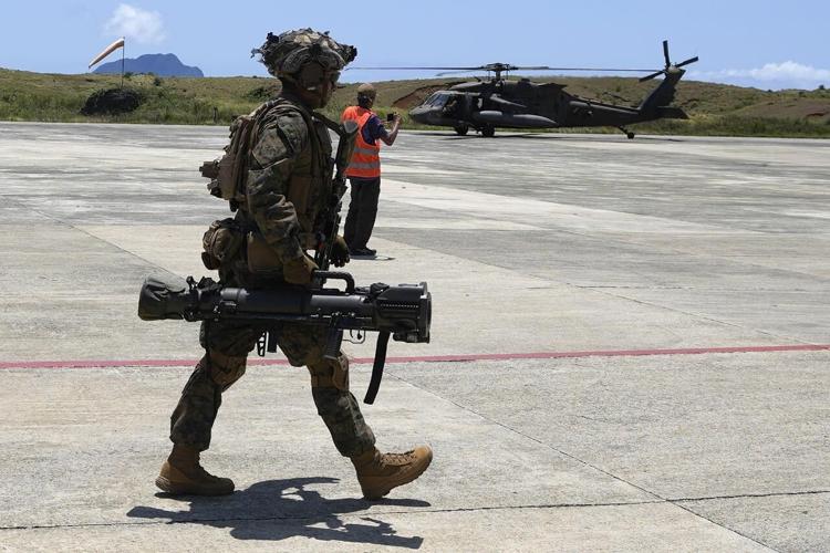 US and Philippine forces stage combat drills near strategic channel off ...