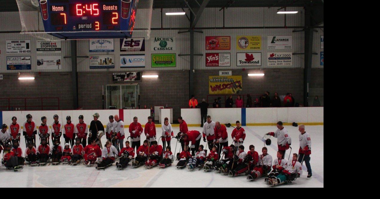 Kids and OPP officers face off in sledge hockey classic