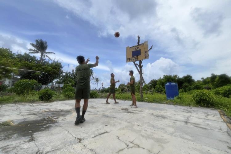 Filipino forces and villagers struggle to live in China's shadow in ...