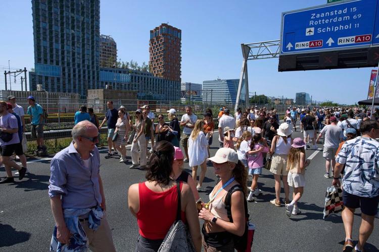 Couples tie the knot during a festival on an Amsterdam ring road