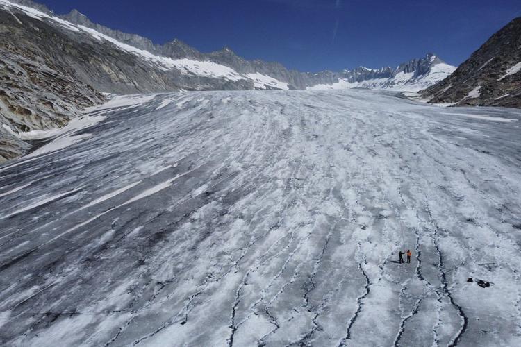 See photos of a Swiss glacier melting in the heat of climate change