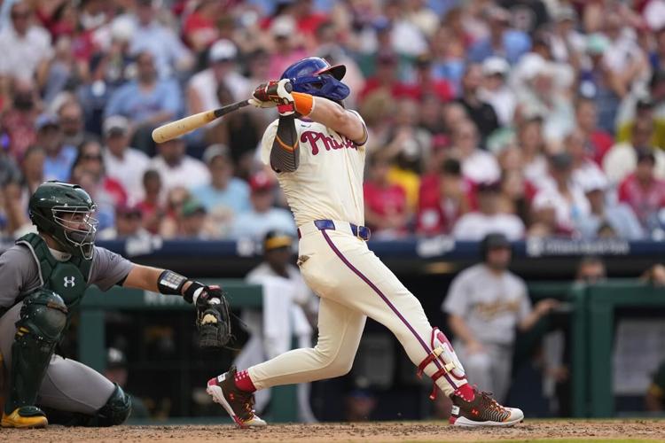 Harper, Turner homer and Phillies beat A's 11-5 to give Phillips the ...