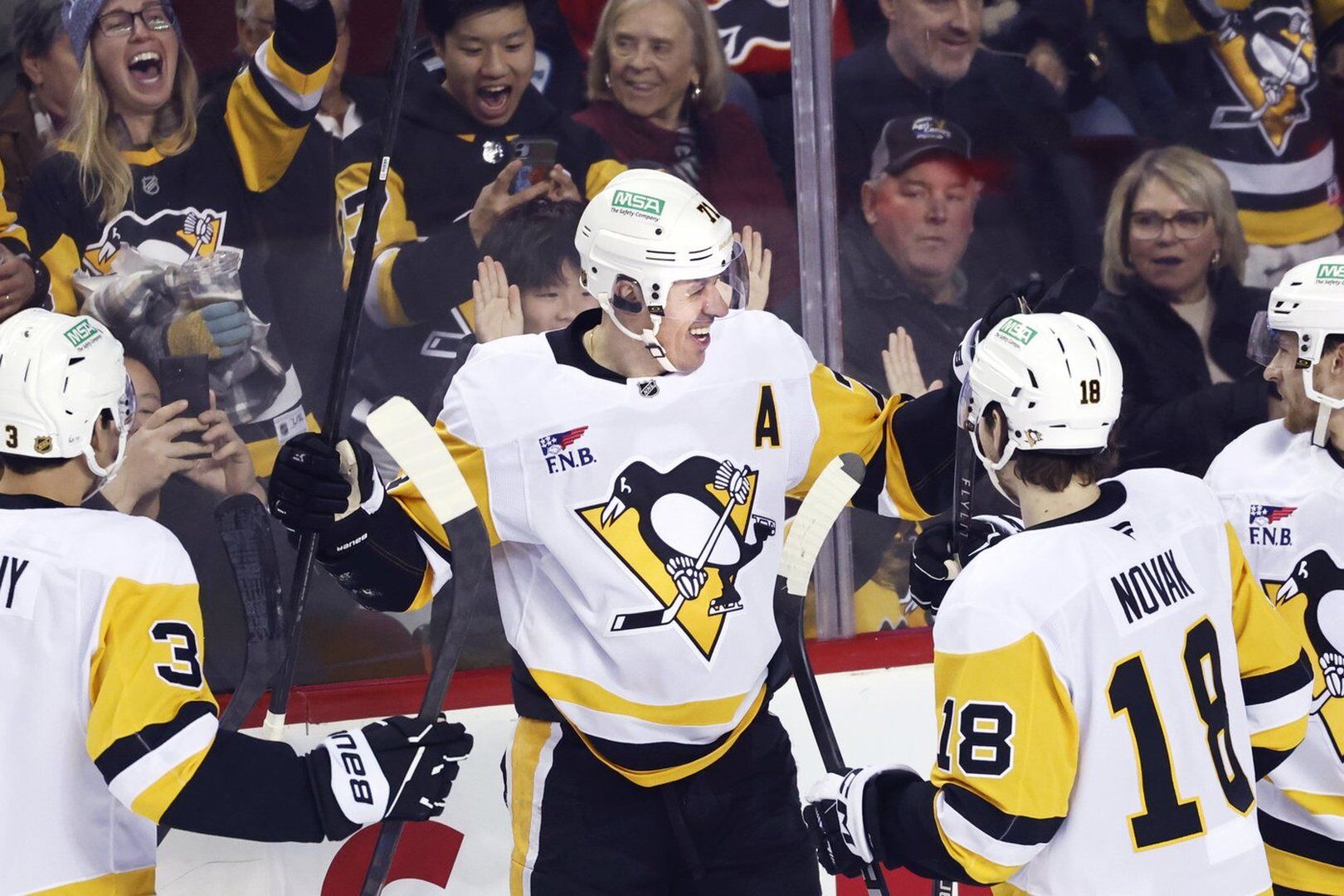 Malkin, Novak lead Pittsburgh Penguins past Calgary Flames 4-1