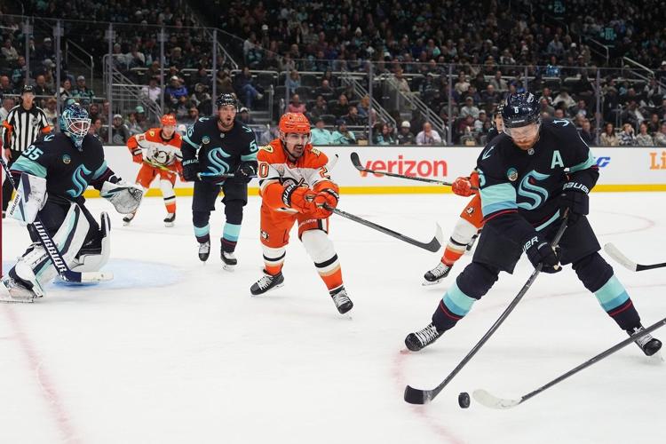 Marchment scores in Seattle debut as Kraken win season opener for first ...
