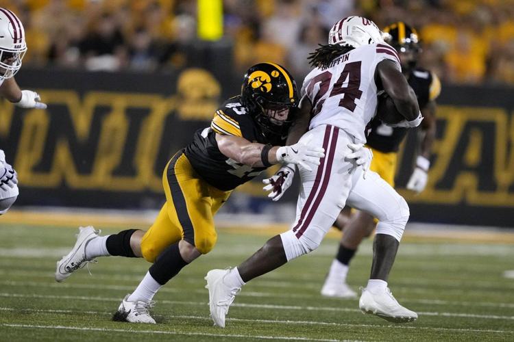 Iowa's Kirk Ferentz becomes Big Ten's winningest coach as Hawkeyes beat Massachusetts, 47-7