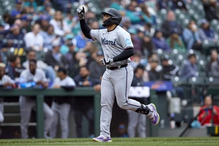 Cal Raleigh hits 10th homer, Logan Evans wins in debut as the Mariners ...
