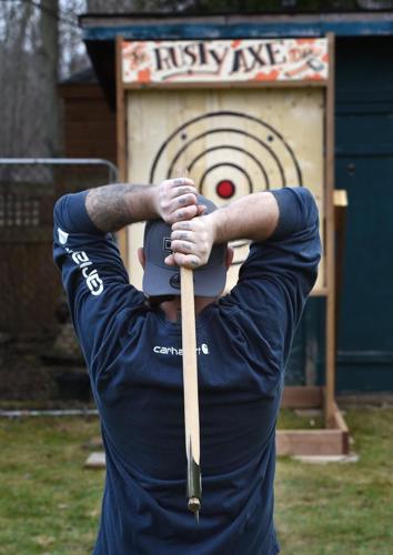 COVID-19 pandemic gives Hamilton axe thrower a new target