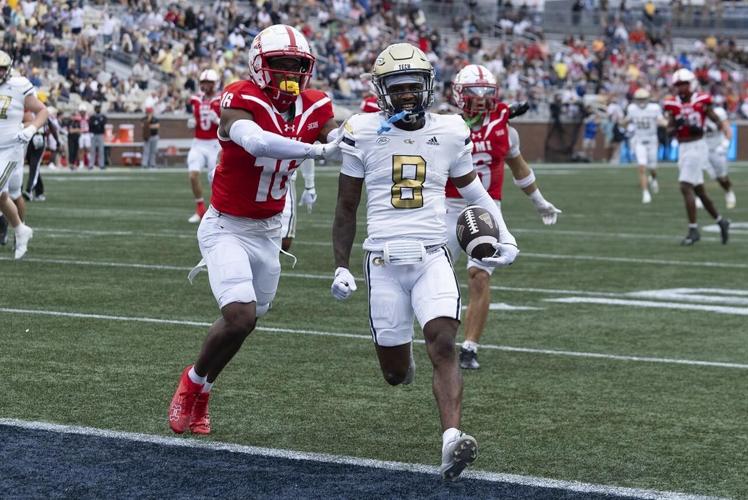 Haynes King throws 3 TD passes as Georgia Tech routs VMI 59-7