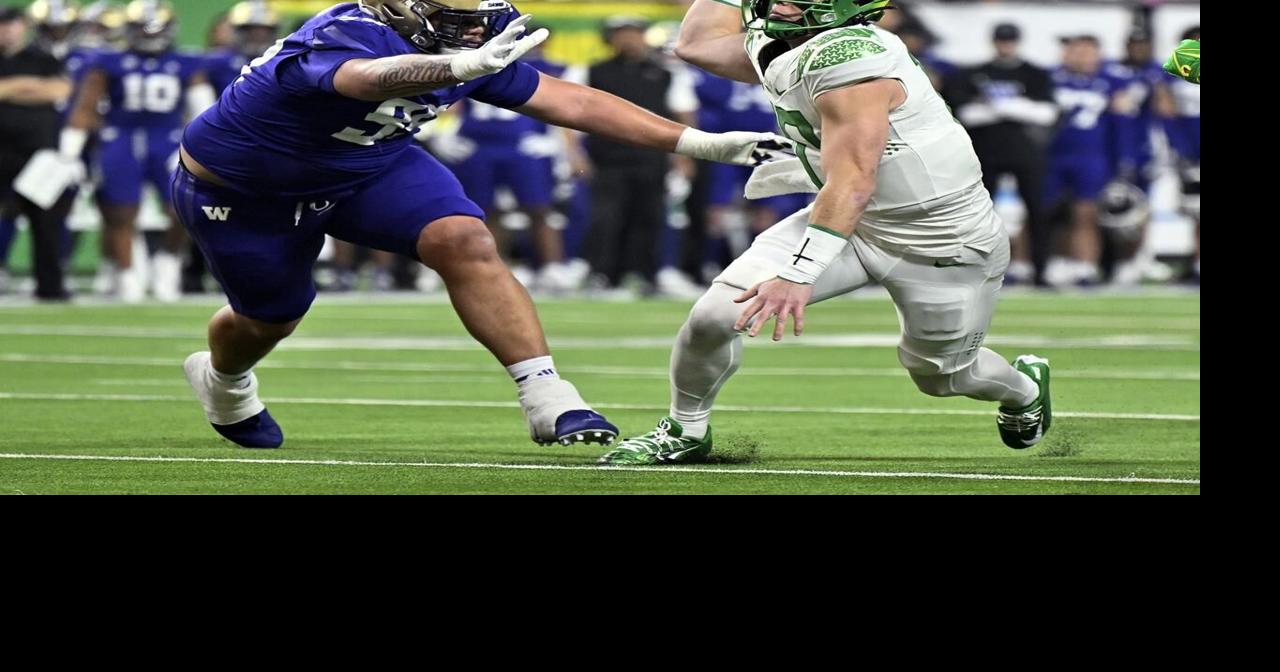 Oregon quarterback Bo Nix dejected after loss in Pac-12 championship ...