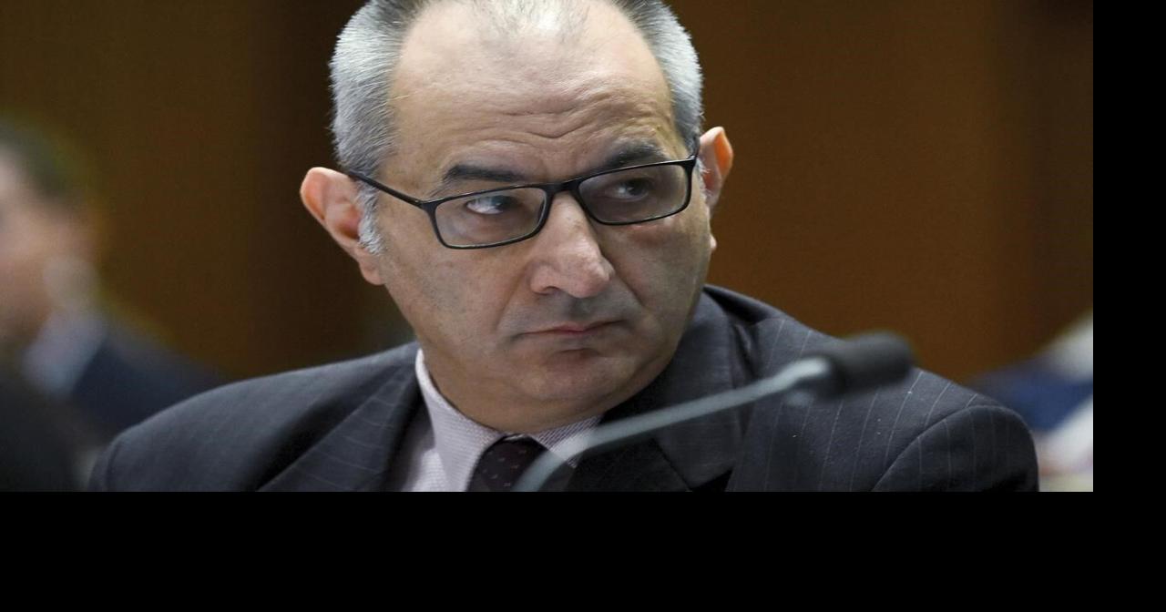 Senior Australian public servant steps aside during probe of encrypted ...