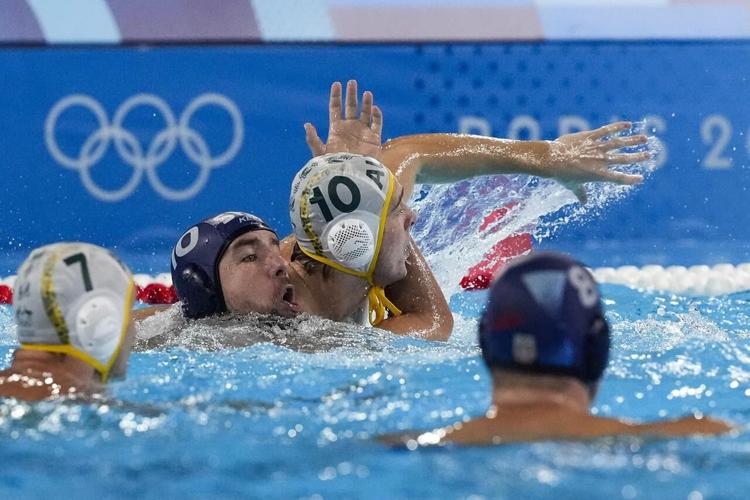 Water polo players wrestle for position at Olympics, but there is a ...
