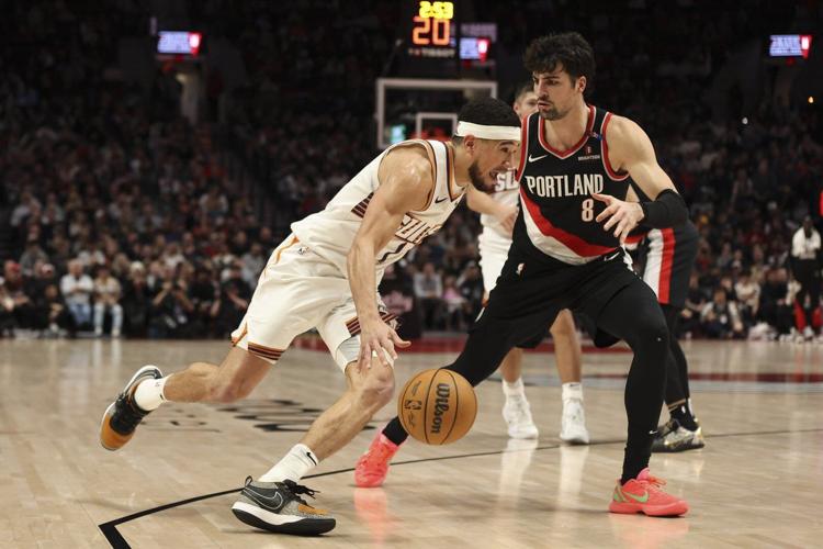 Deandre Ayton leads Trail Blazers to 127-108 victory over Suns in opener of 2-game set