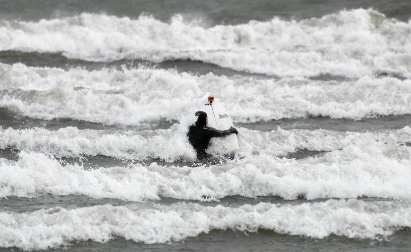 Surfing the pounding Lake Ontario waves
