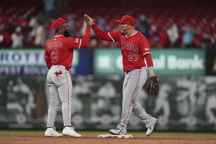 Angels score 3 in the 10th inning and 3 in the 11th for a 9-7 victory ...