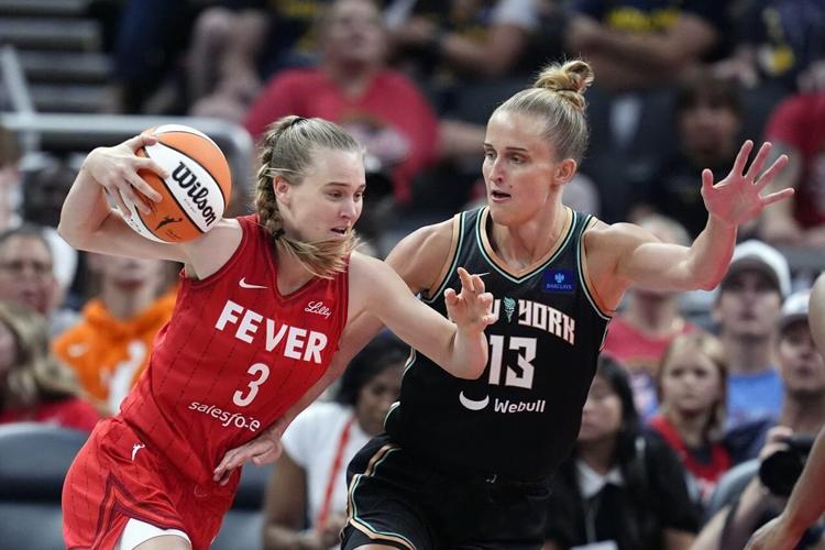 Caitlin Clark rallies Fever past Liberty 83-78 with first triple-double ...
