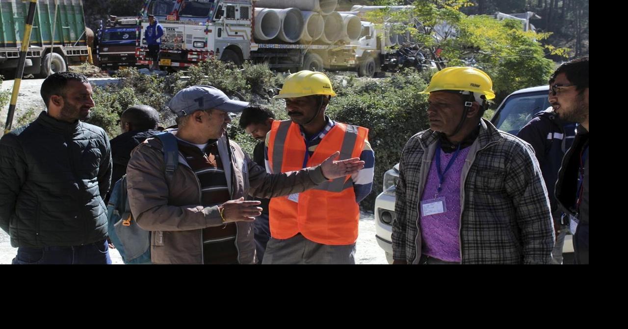 Digging to rescue 41 workers trapped in a collapsed tunnel in India ...