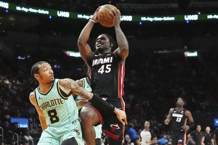 Wiggins scores 42 points and Heat roll past Hornets 122-105 to snap 10-game losing streak