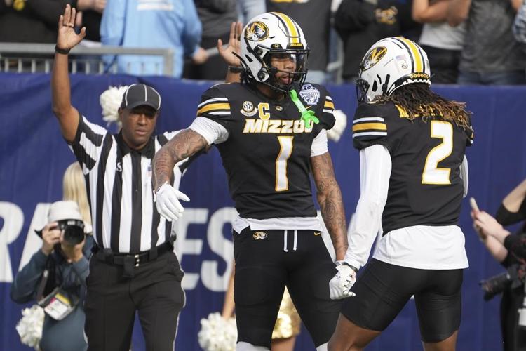No. 23 Missouri rallies from 10 down, beats Iowa 27-24 in the Music ...