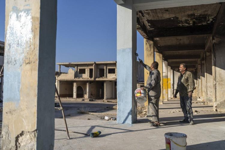 AP PHOTOS: In northern Syria, displaced owners return to houses with no ...